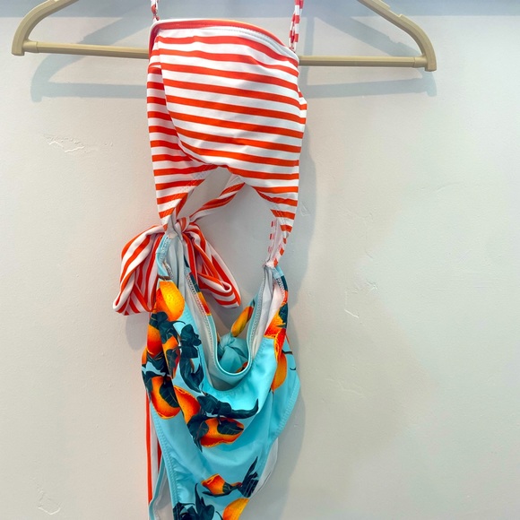 Swim | There Is A Cut Out Stomach Look With An Open Back With Two Ties ...
